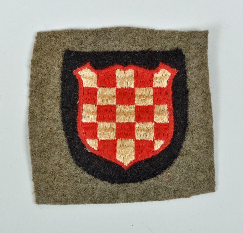 Regimentals | GERMAN WWII CROAT ARM SHIELD ON UNIFORM CLOTH.