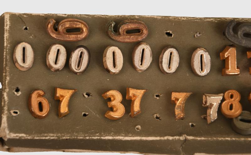 Regimentals | GERMAN WWII DISPLAY OF NUMBERS AND LETTERS.